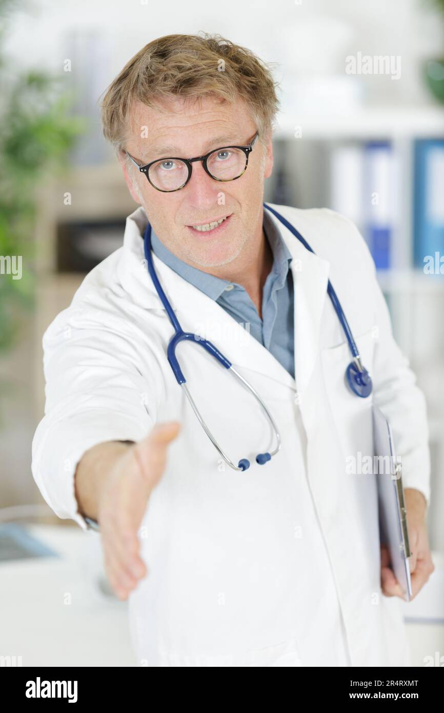 doctor shaking hands at hospital Stock Photo - Alamy