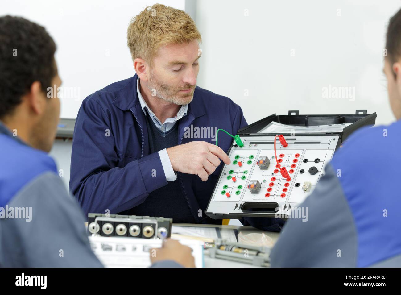 electrical engineering students studying the terminals Stock Photo - Alamy