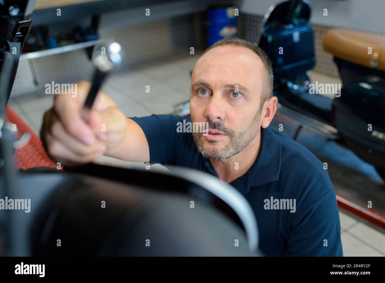 Reaching tool hi-res stock photography and images - Alamy