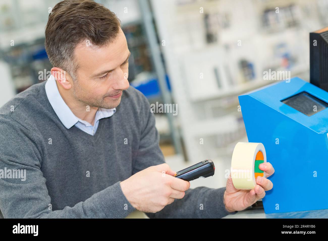 Man scanning purchase code hi-res stock photography and images - Alamy