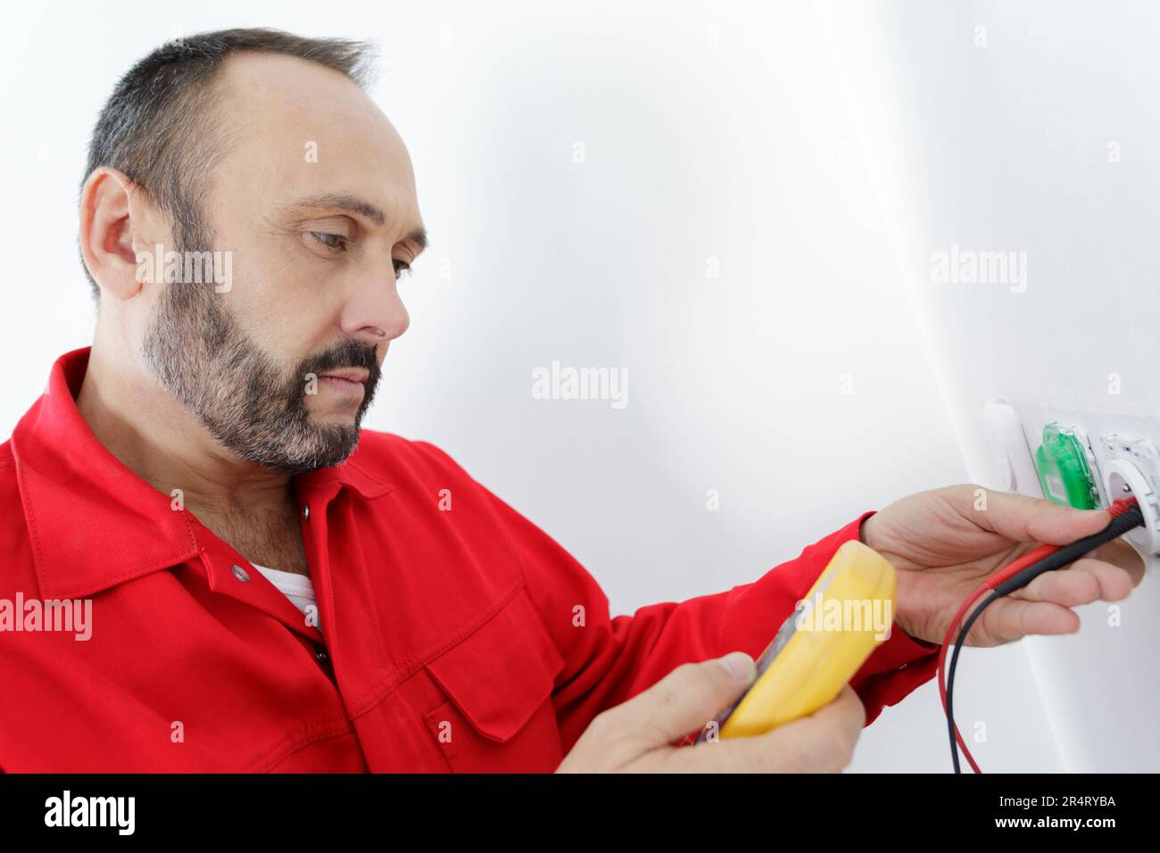 repair electricity socket man with bare hands Stock Photo - Alamy