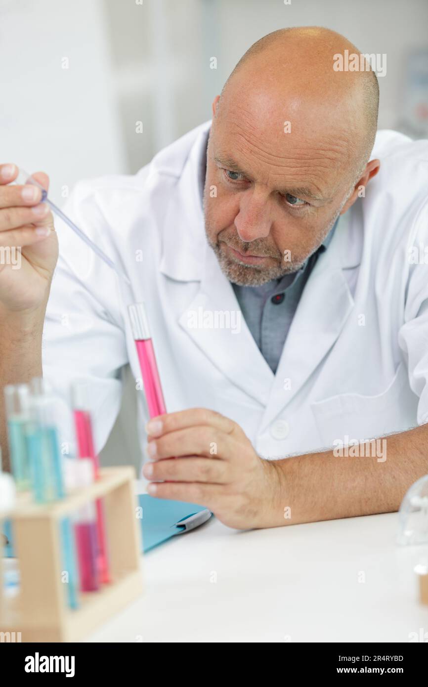Mixing chemical hi-res stock photography and images - Alamy