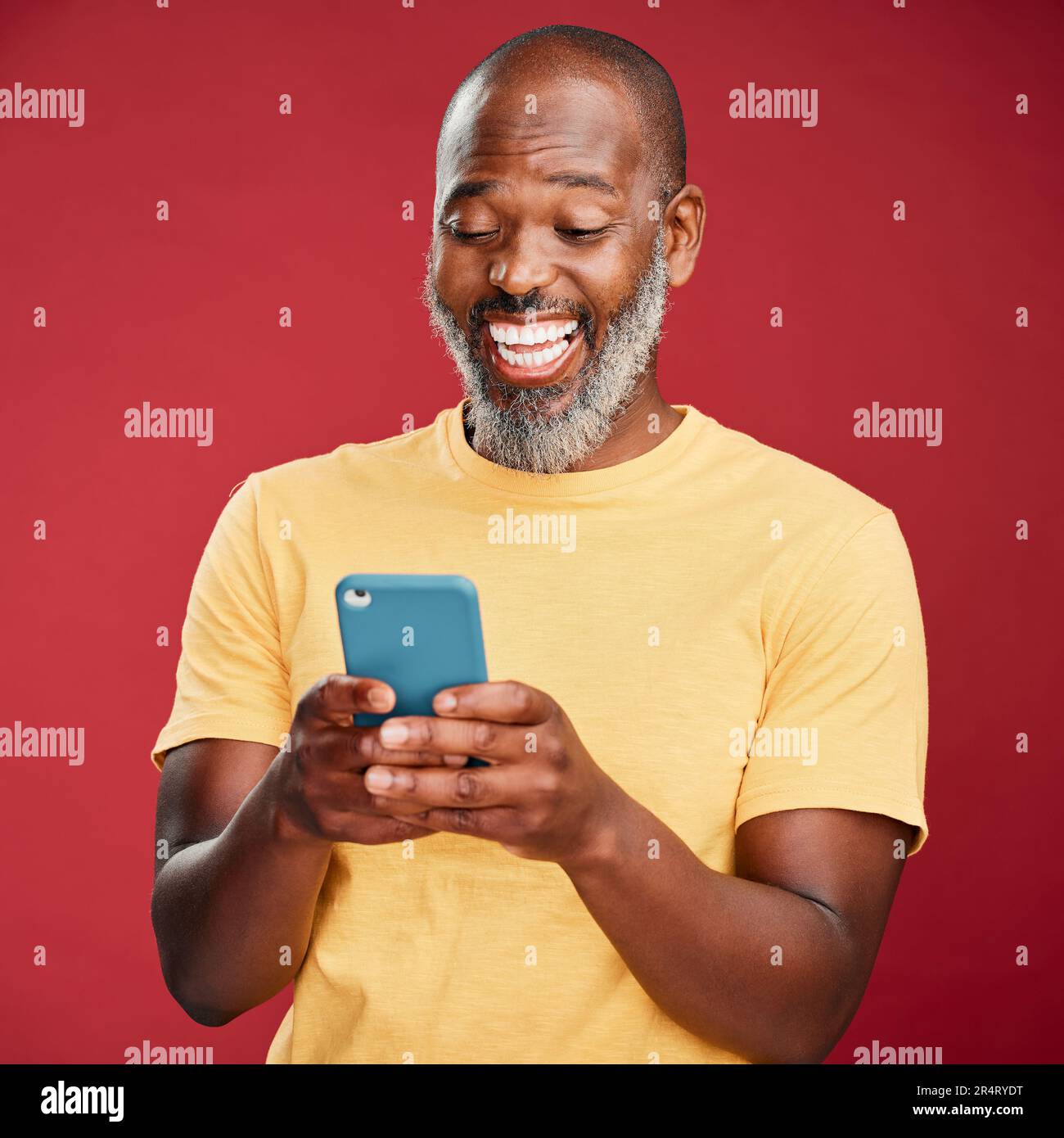 Studio, black man and smile for phone communication, social media or ...
