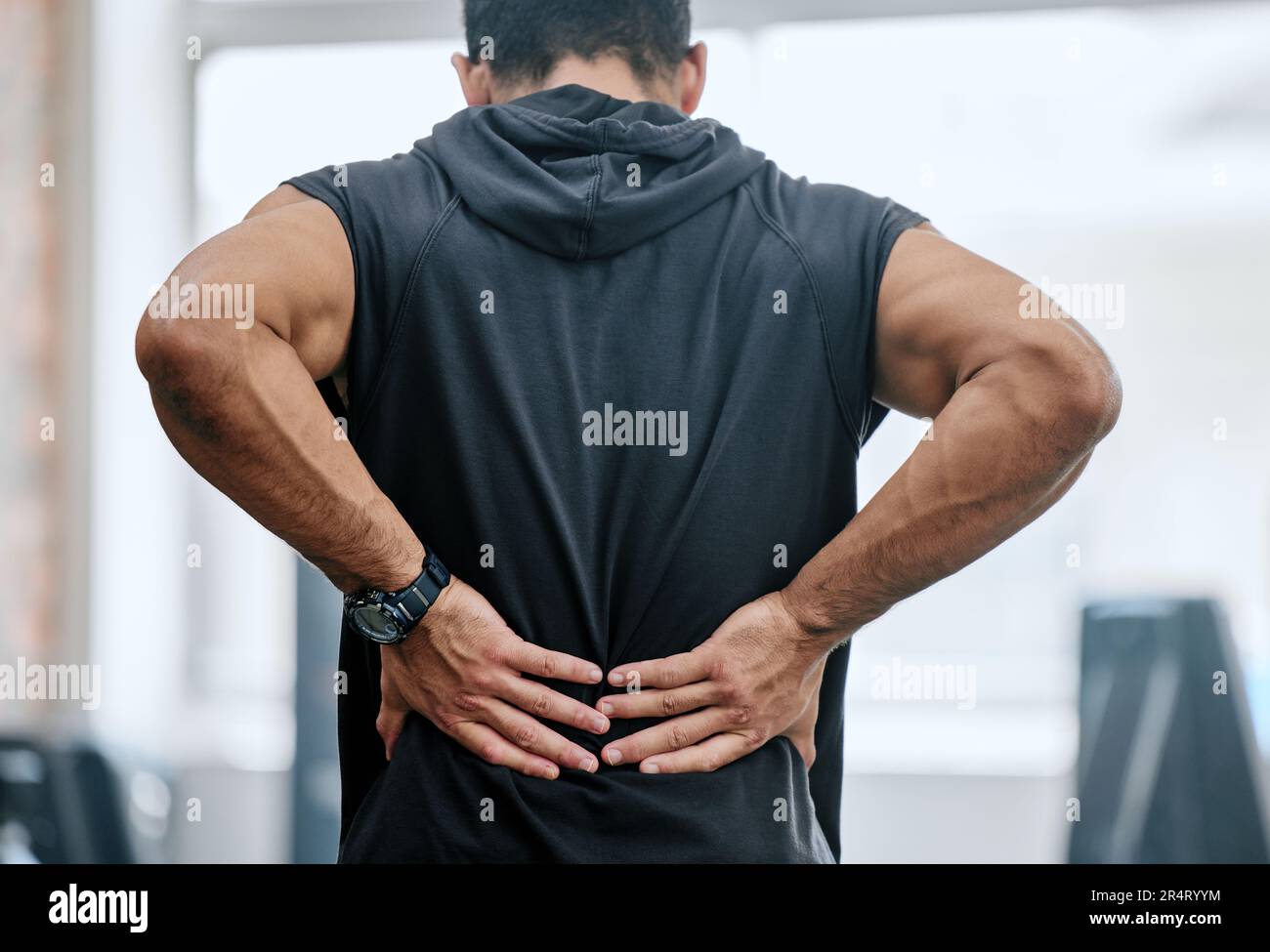 Fitness, gym and man with hands on back pain, medical emergency and ...