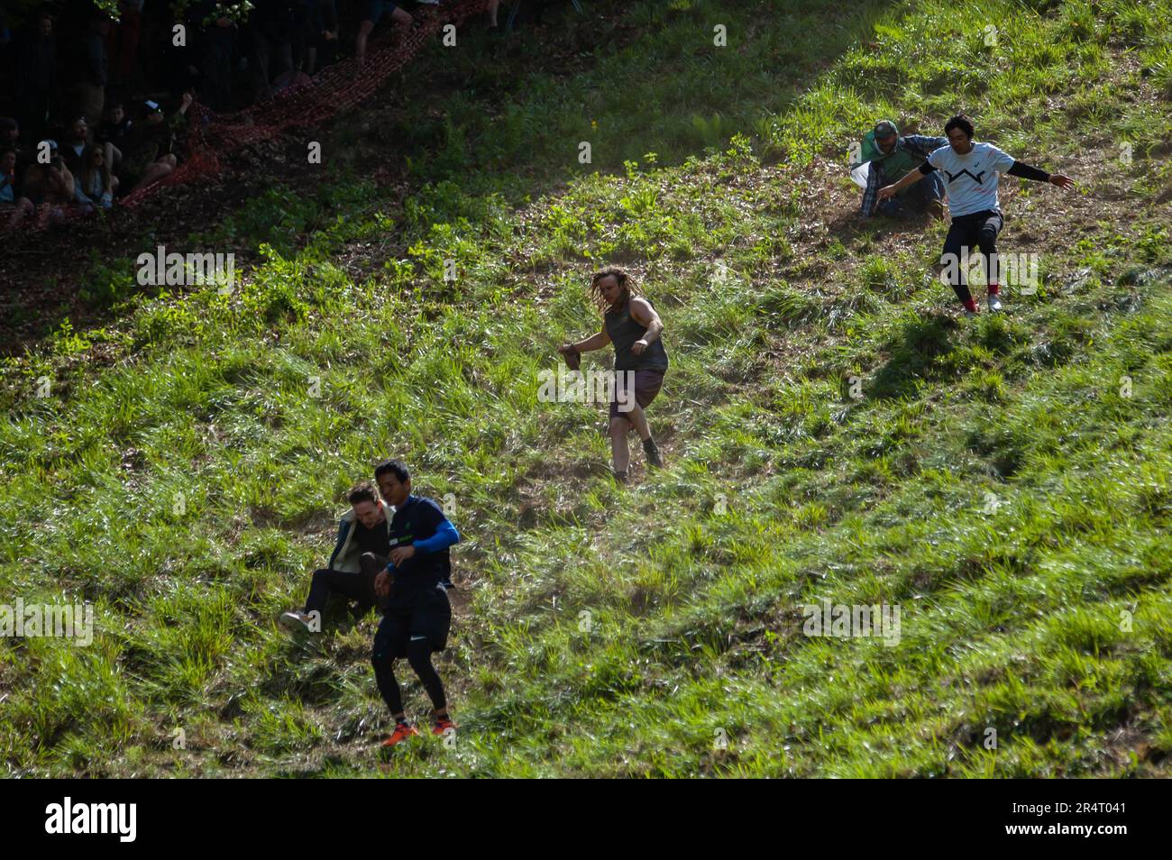 BROCKWORTH, GLOUCESTERSHIRE, ENGLAND - 29 May 2023: People taking part in the annual Cooper's ...