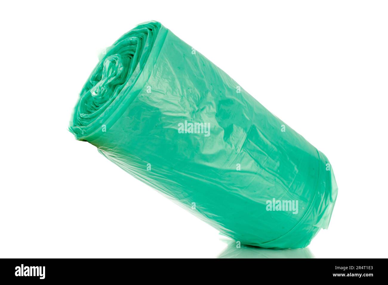 One pack of plastic trash bags, macro, isolated on white background ...