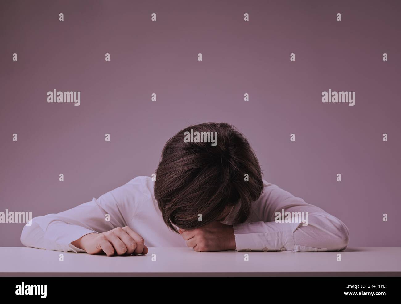 Woman hunched over hi-res stock photography and images - Alamy