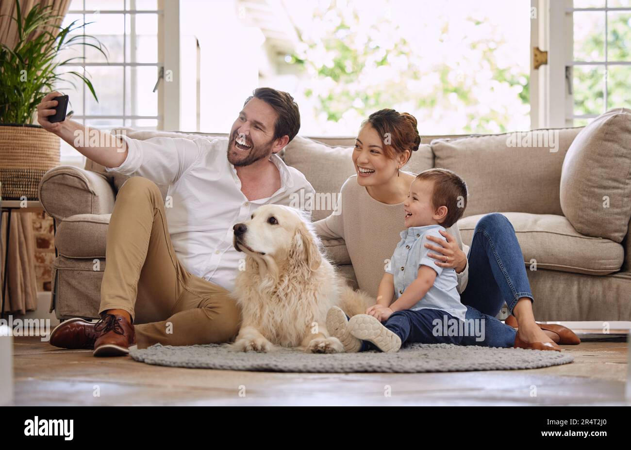 Selfie, social media and happy family in the living room with a dog for ...
