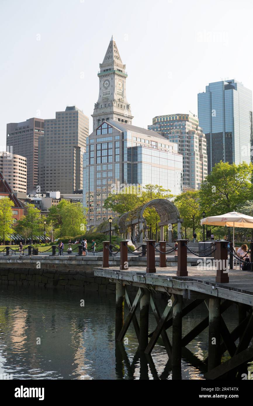 USA, Massachusetts, Boston, Boat waterside walkway with Custom House ...