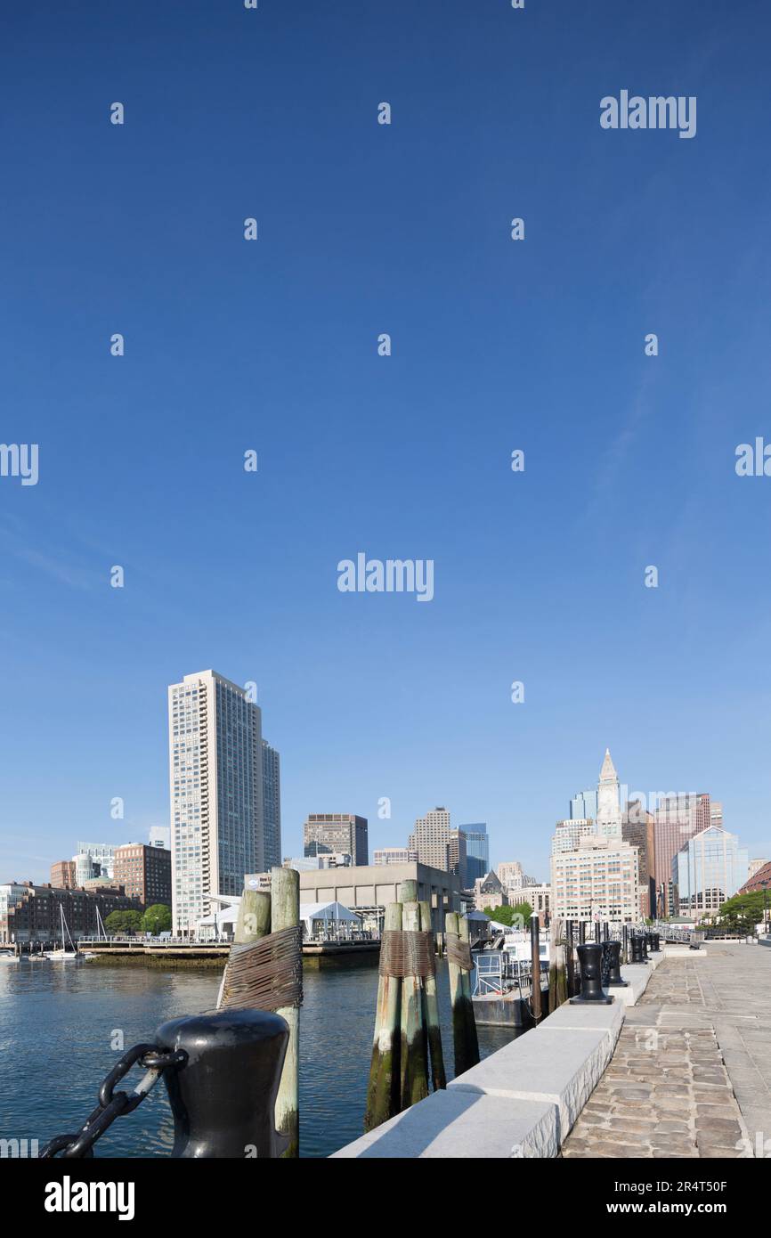 USA, Massachusetts, Boston, Sidewalk and Harbour with skyline in ...