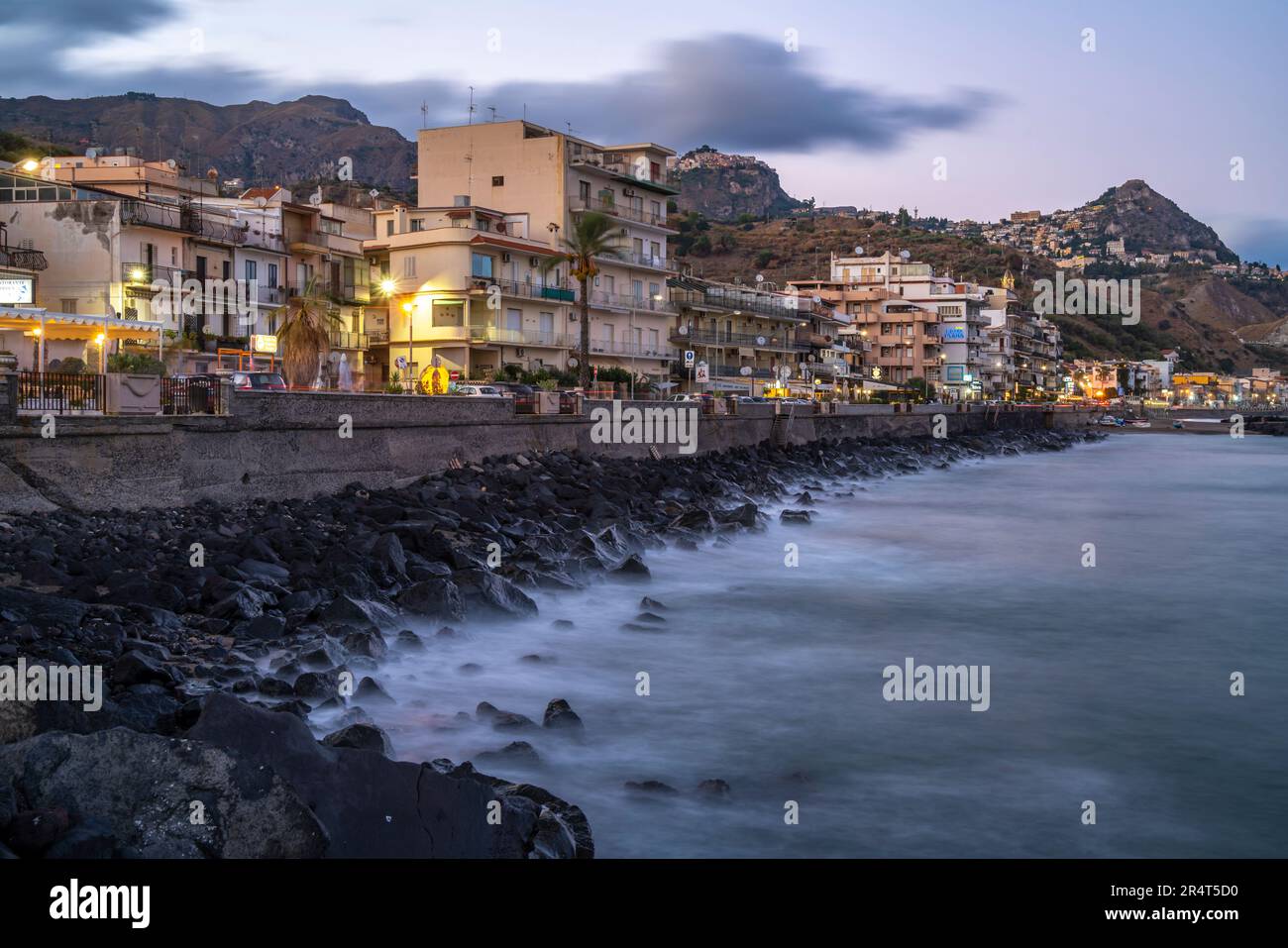 View of Castelmola, Taormina and Giardini Naxos viewed from Giardini ...