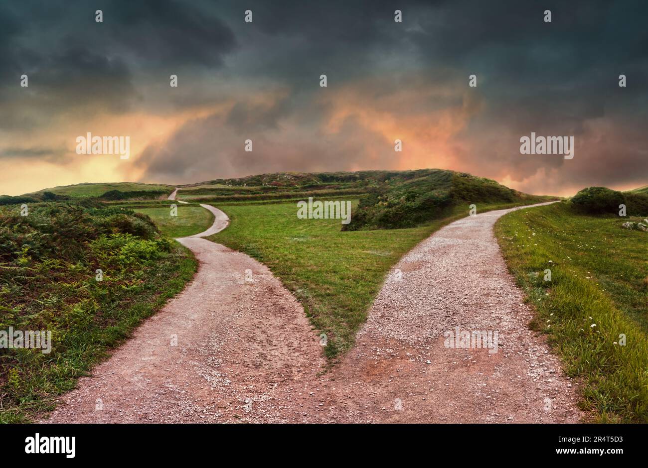 landscape of a fork in the road at storm weather, concept of insecurity ...