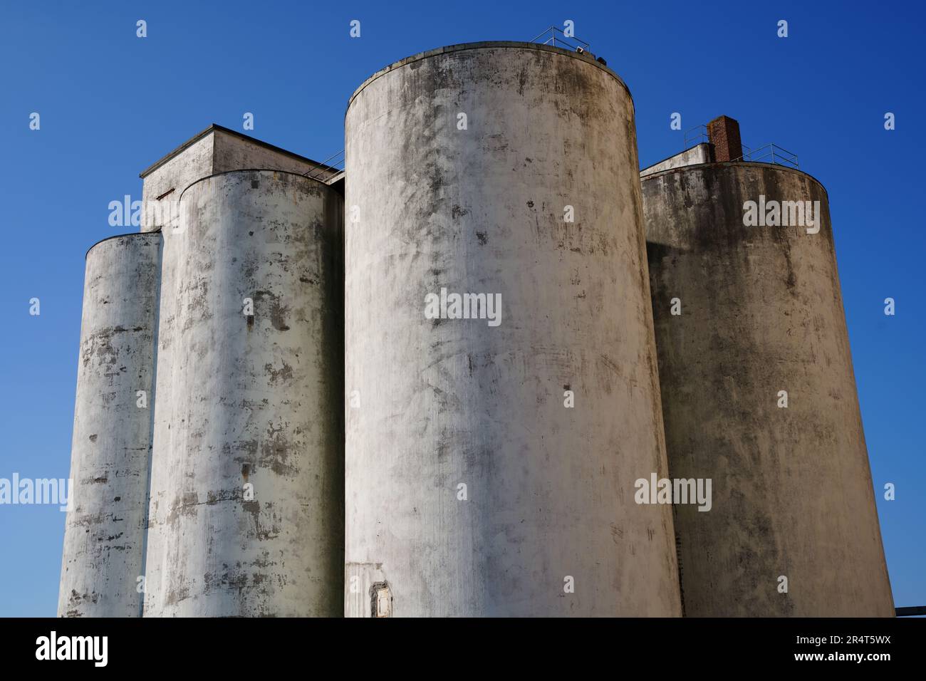 White Silos At Sunset Stock Photo - Alamy