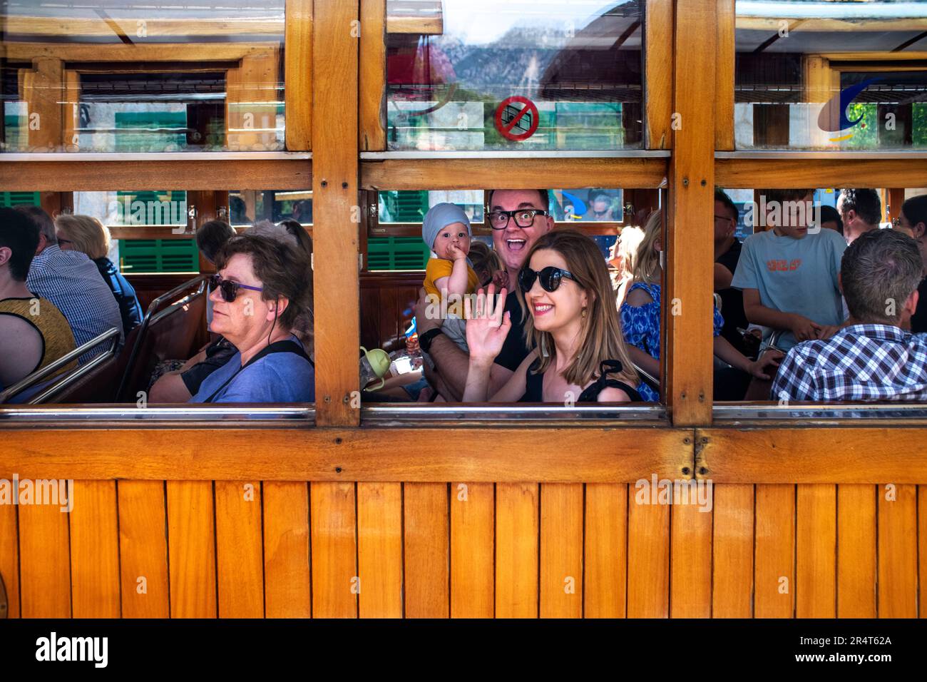 Passengers of the tren de Soller train vintage historic train that ...