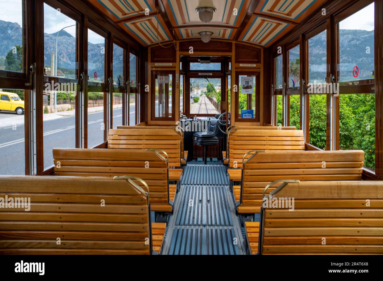 Seats inside of the vintage tram at the railway station in Soller. The ...