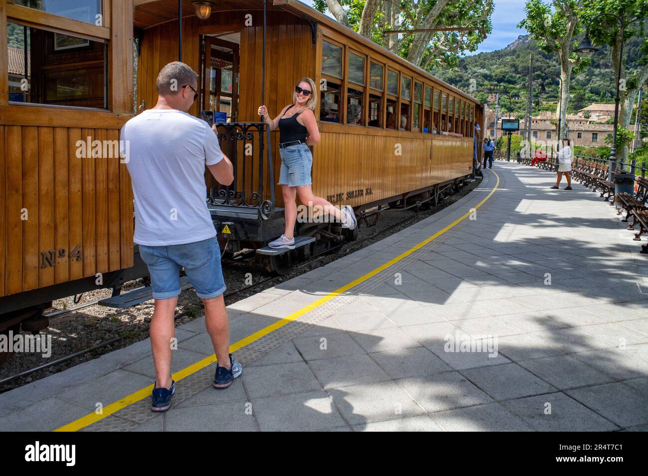 Tourists taken pictures in the tren de Soller train vintage historic ...