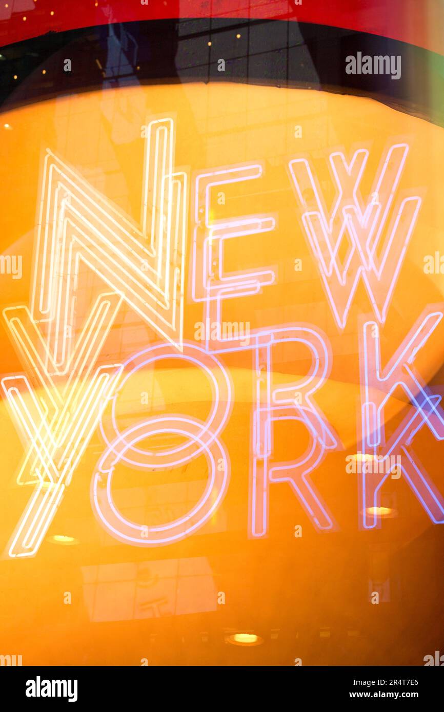 US, New York, ‘New York’; Neon lights reflected and multiple exposure ...