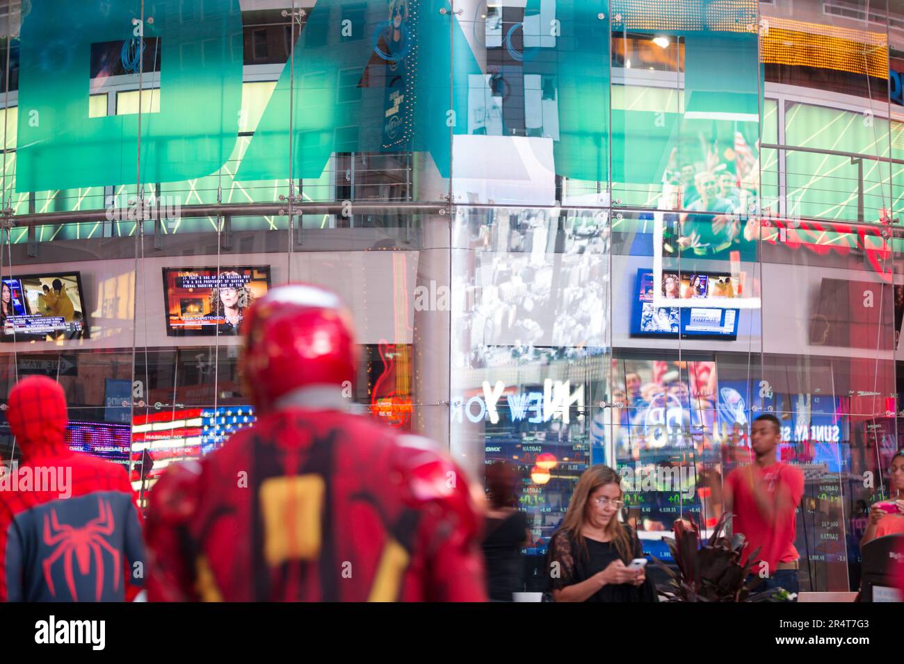 US, New York, Times square-action hero’s and Neon lights Stock Photo ...