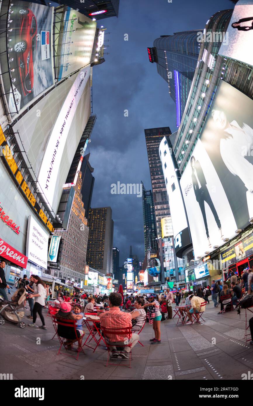 US, New York, Neon Billboards in Times square and the public seating ...