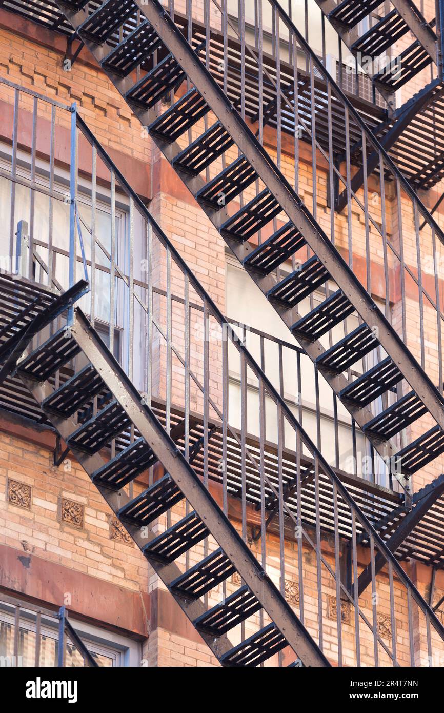 US, New York, fire escape ladders in the historic seaport district ...
