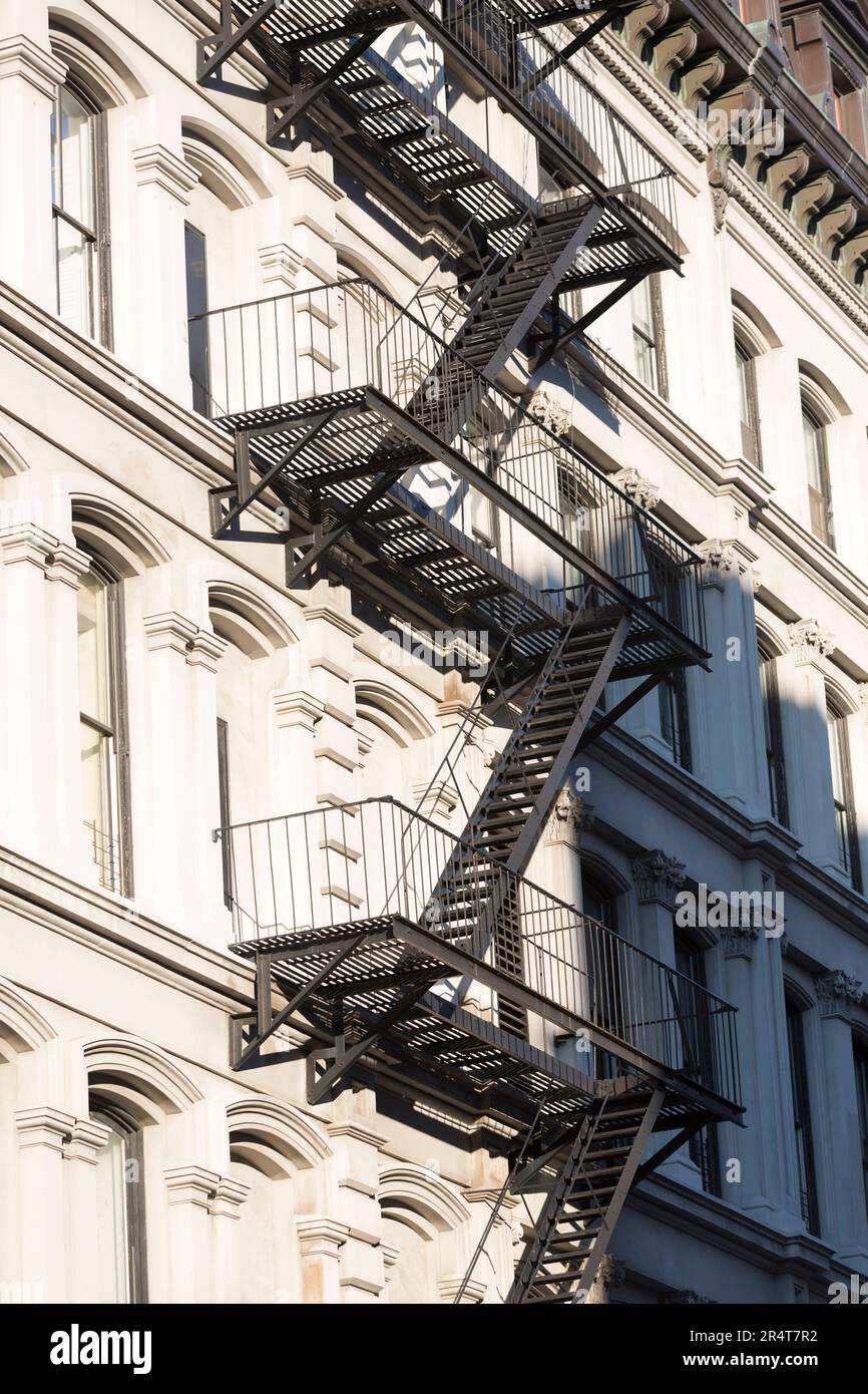 US, New York, fire escape ladders in the historic seaport district ...
