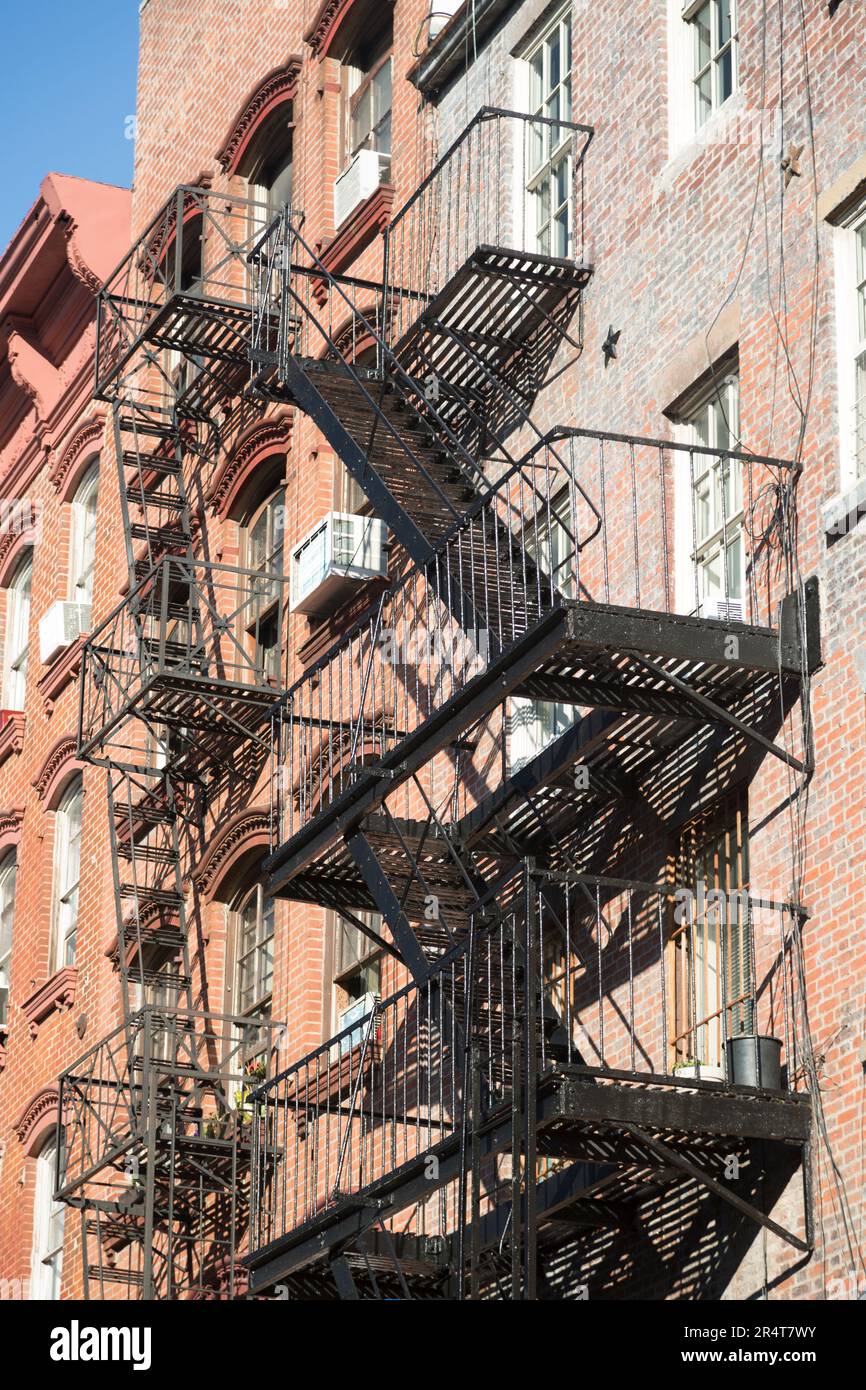 US, New York, Fire escape ladders in the historic seaport district ...
