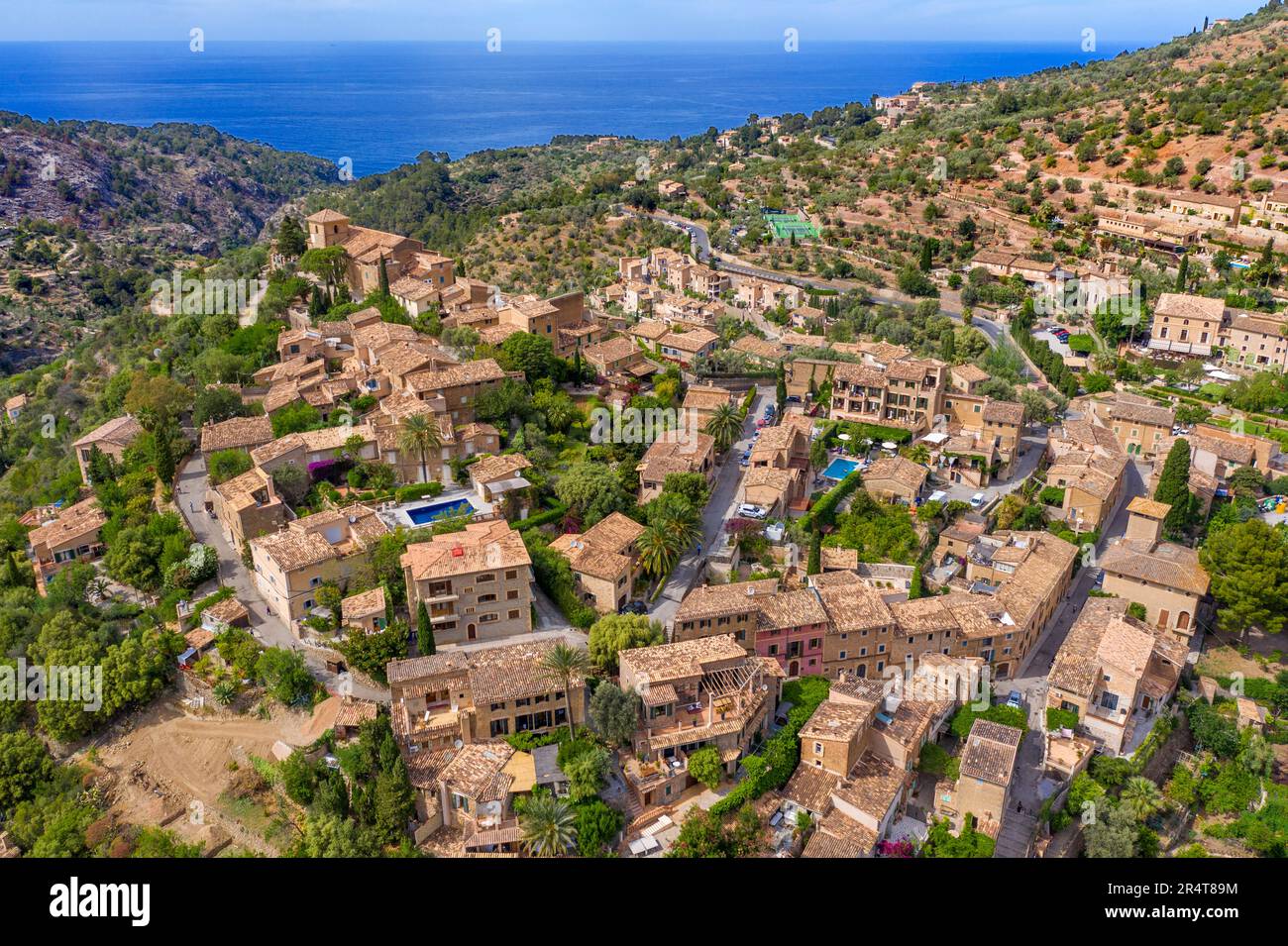 Aerial view of the hilltop village of Deia, Deya Municipality, Mallorca ...