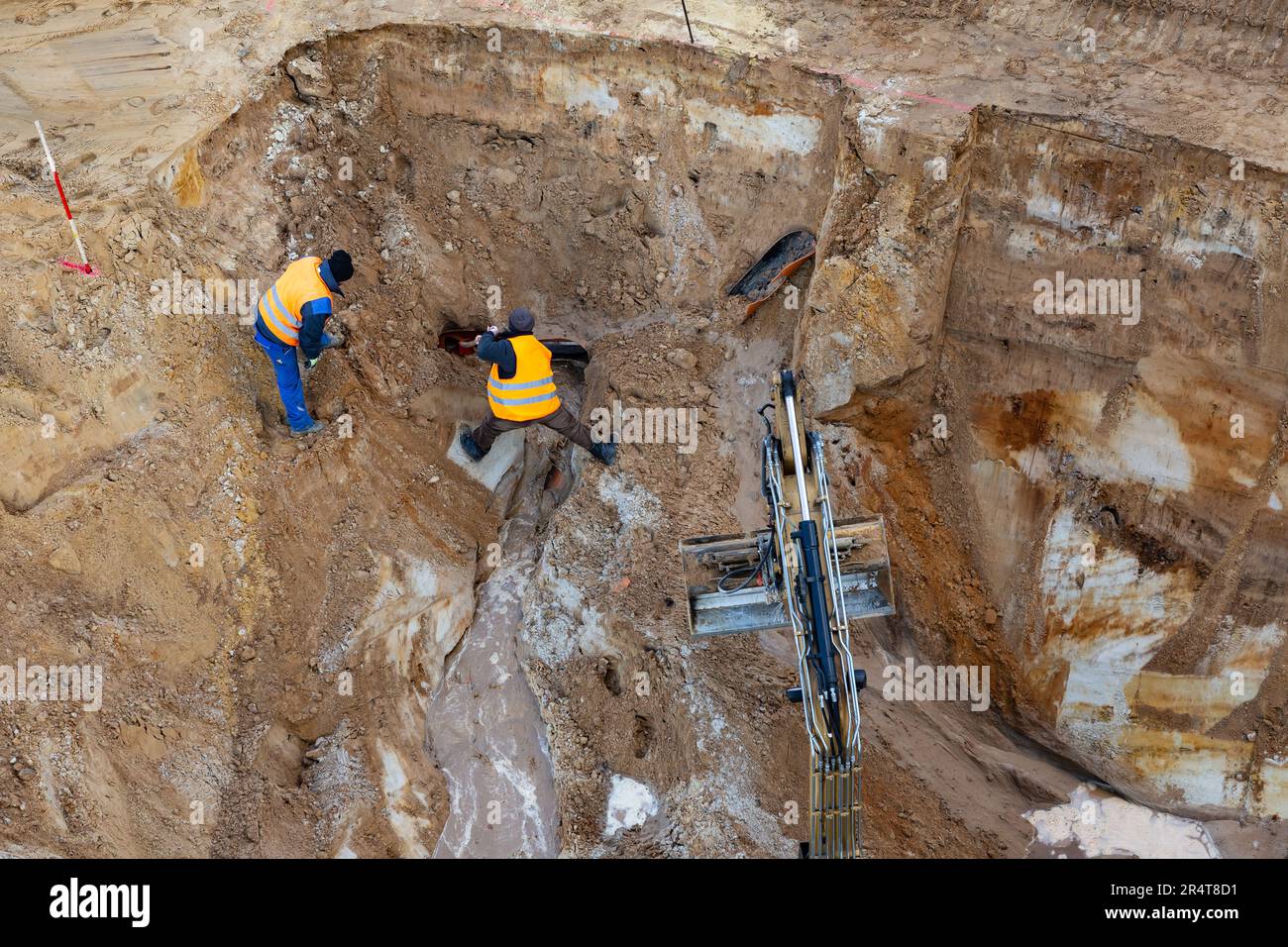 pipe damage due to excavation work on the construction site Stock Photo ...