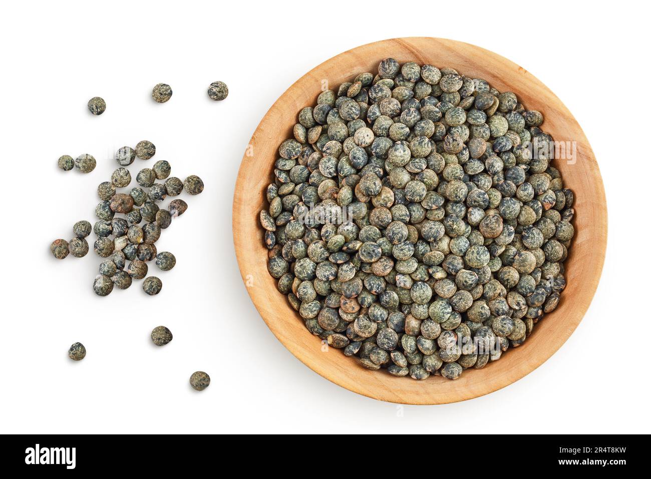 raw french green lentils in wooden bowl isolated on white background ...