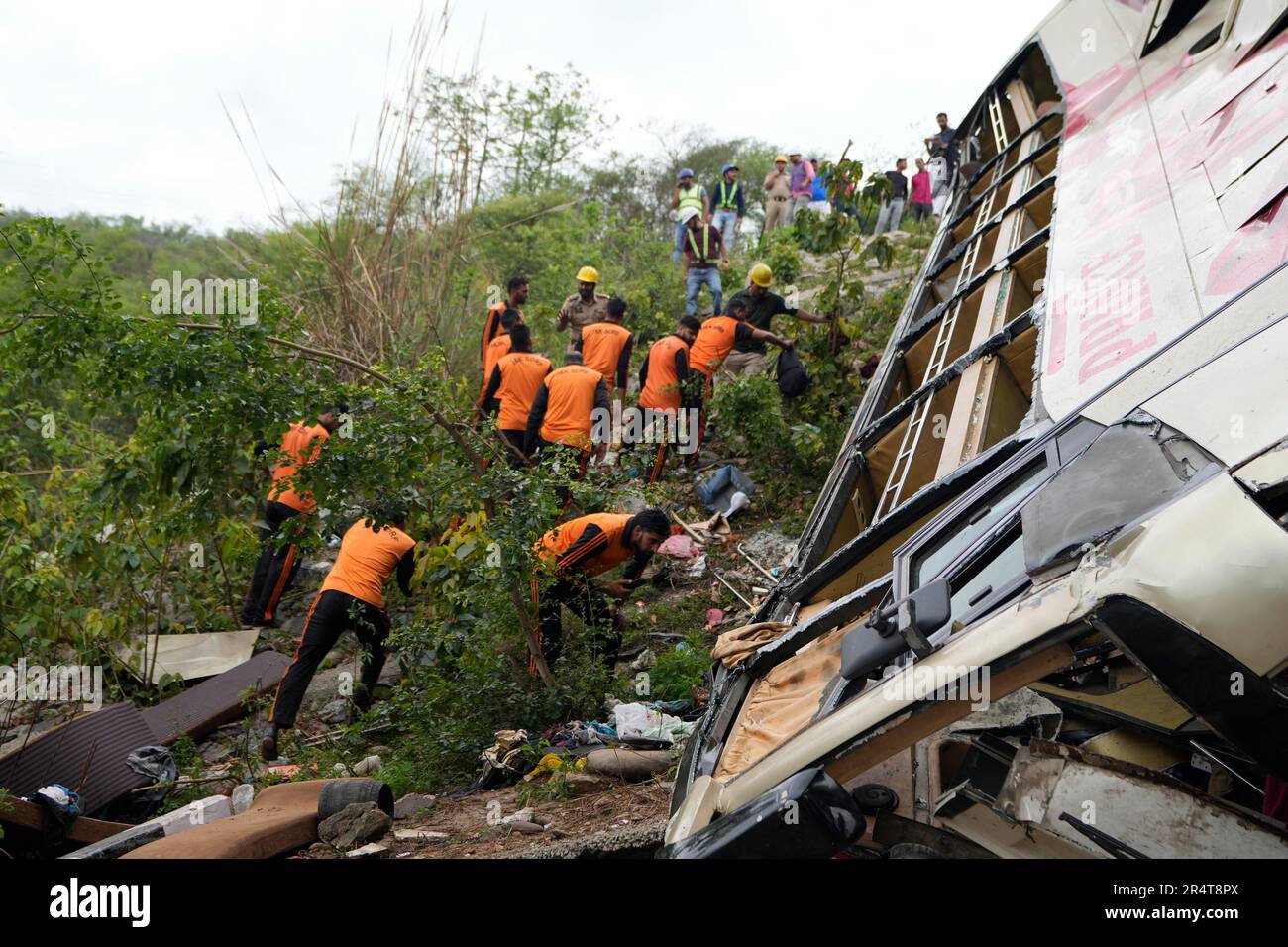 Jammu & Kashmir State Disaster Response Force (SDRF) personnel inspect ...