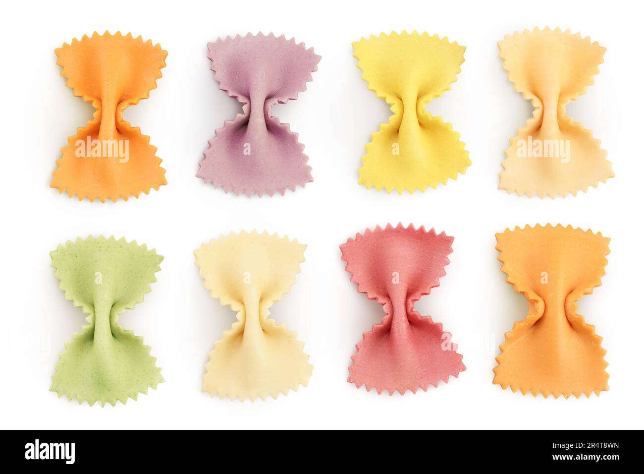 colorful farfalle pasta isolated on white background with depth of ...