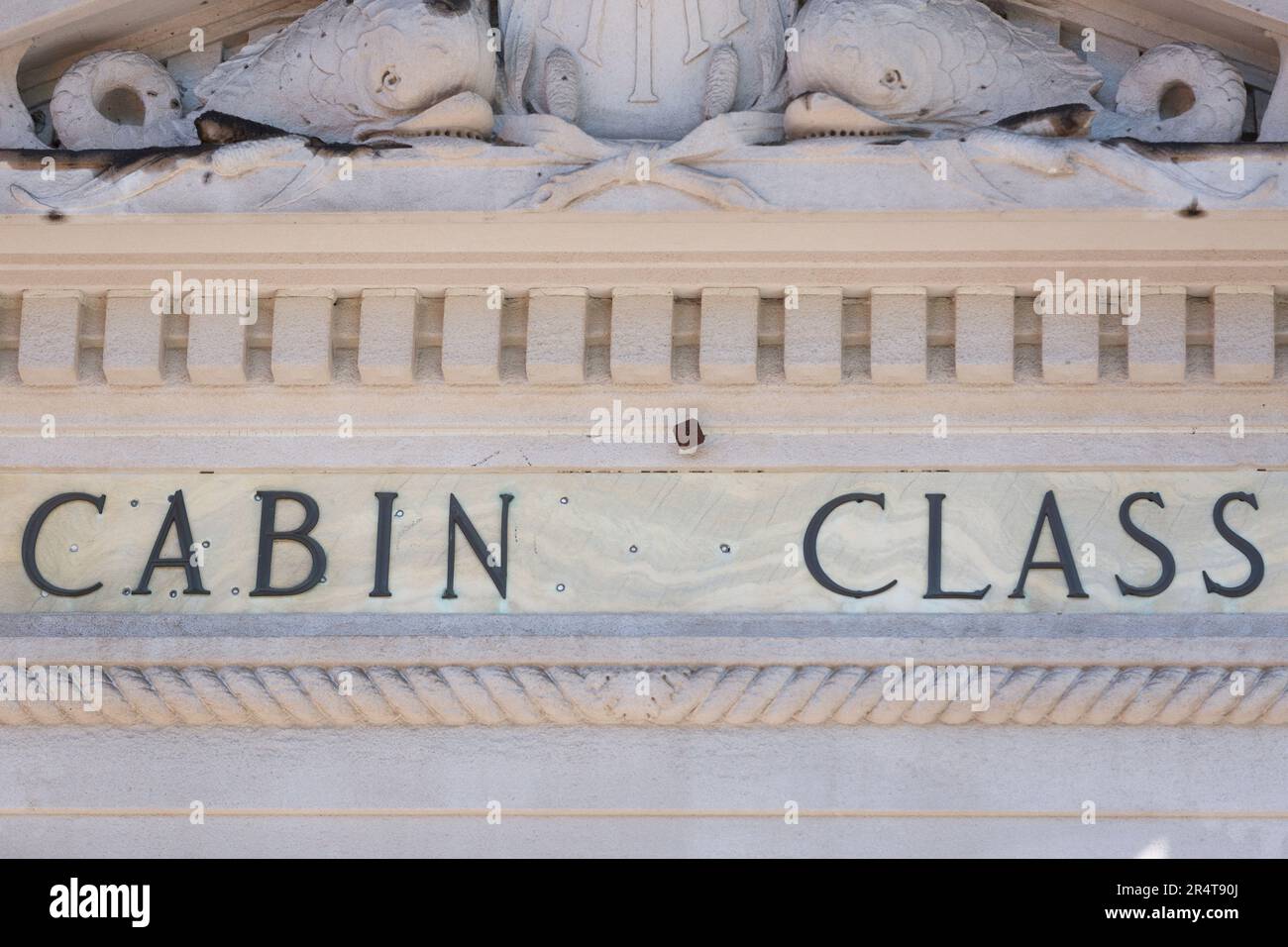 US, New York, ‘First Class’ signage on entrance way of Historic bulding ...
