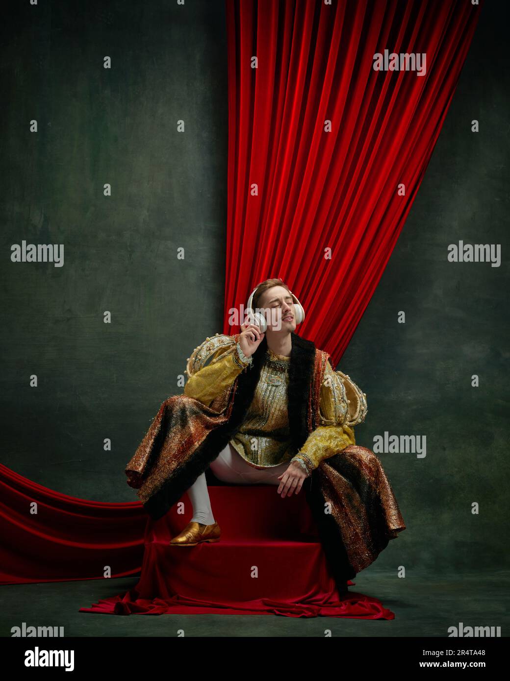 Delightful. Portrait of young man, royal person, prince listening to ...