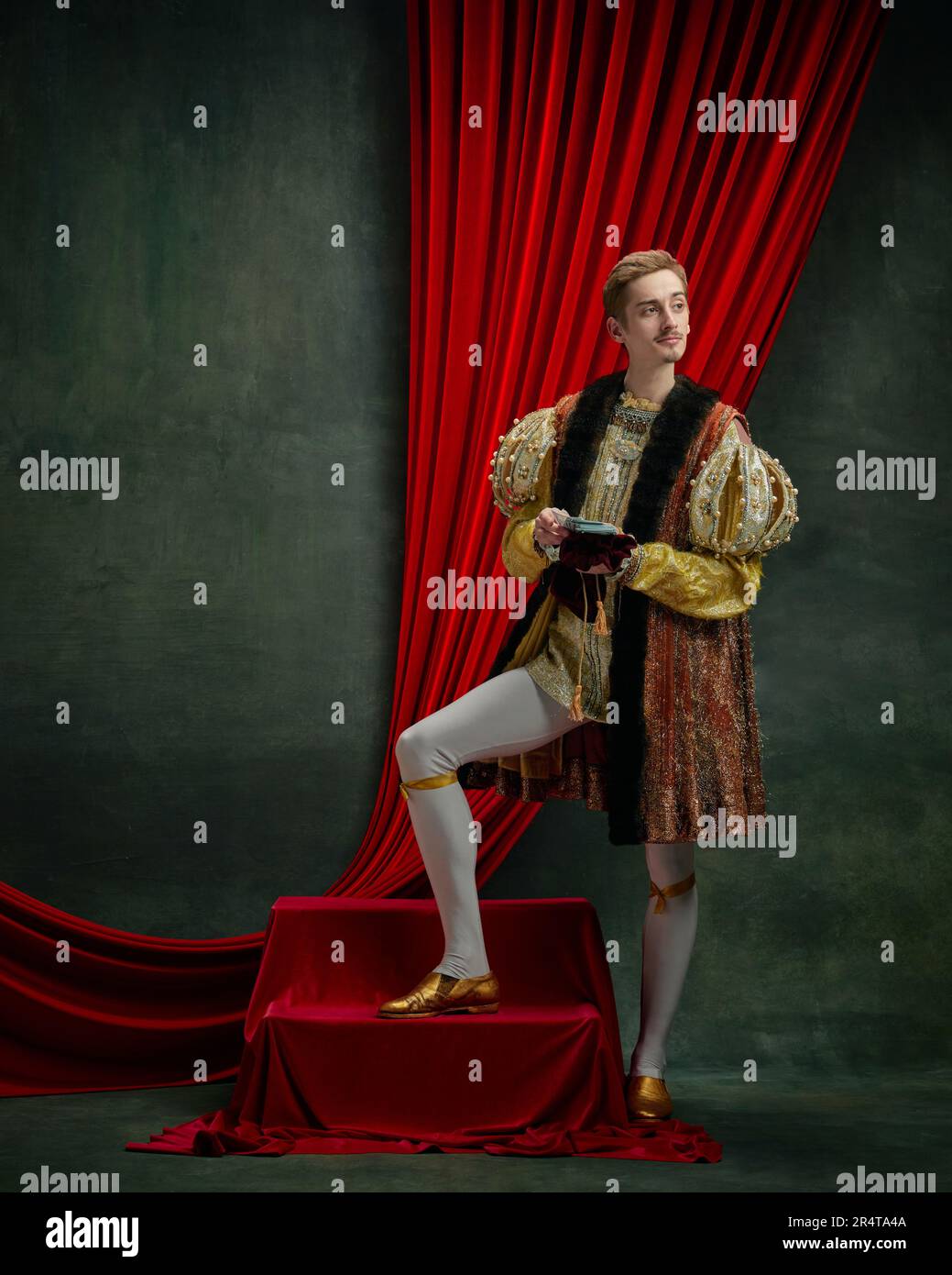 Portrait of young man, royal person standing and counting paper money ...