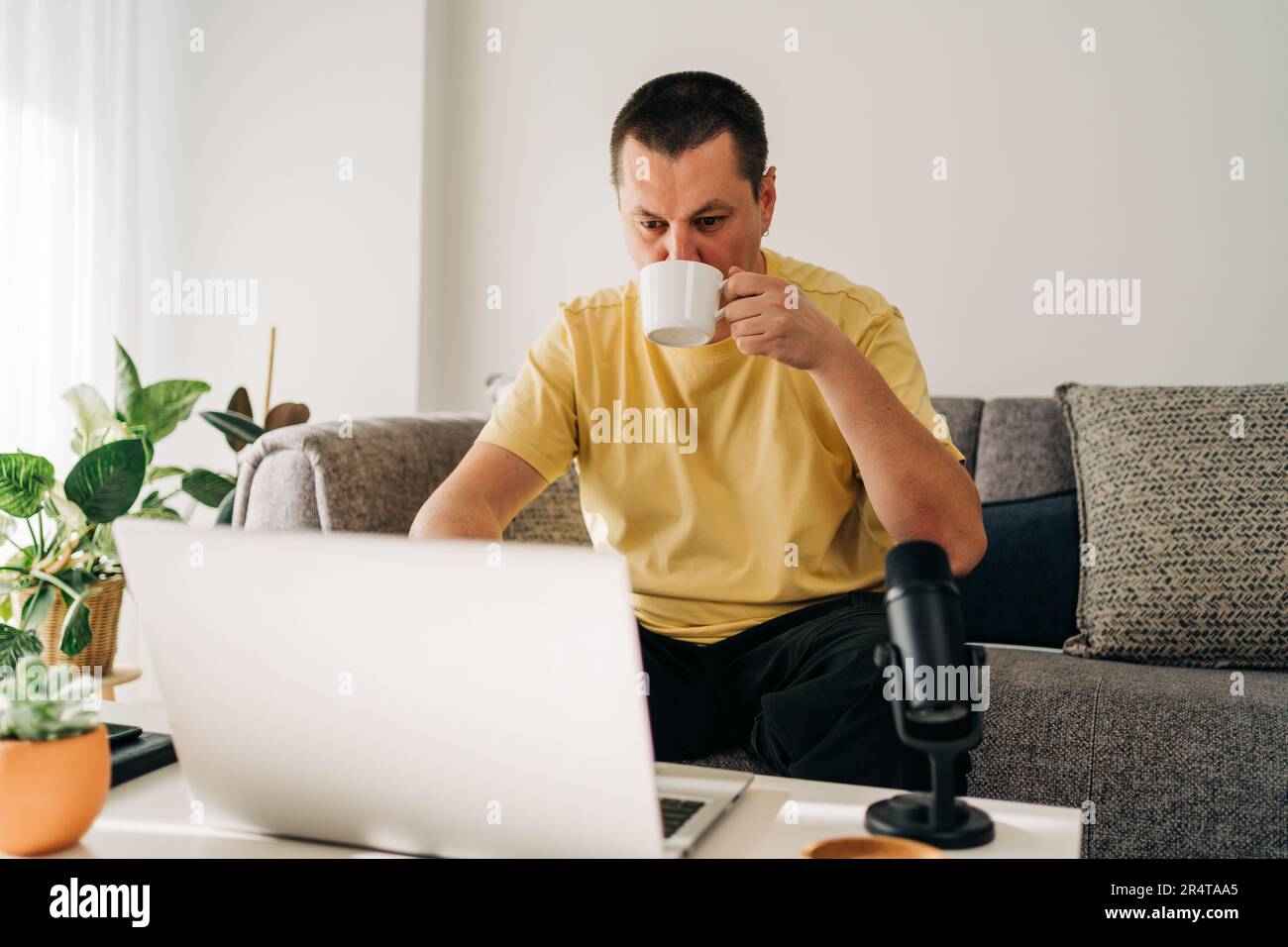 Freelancer men microphone typing hi-res stock photography and images ...