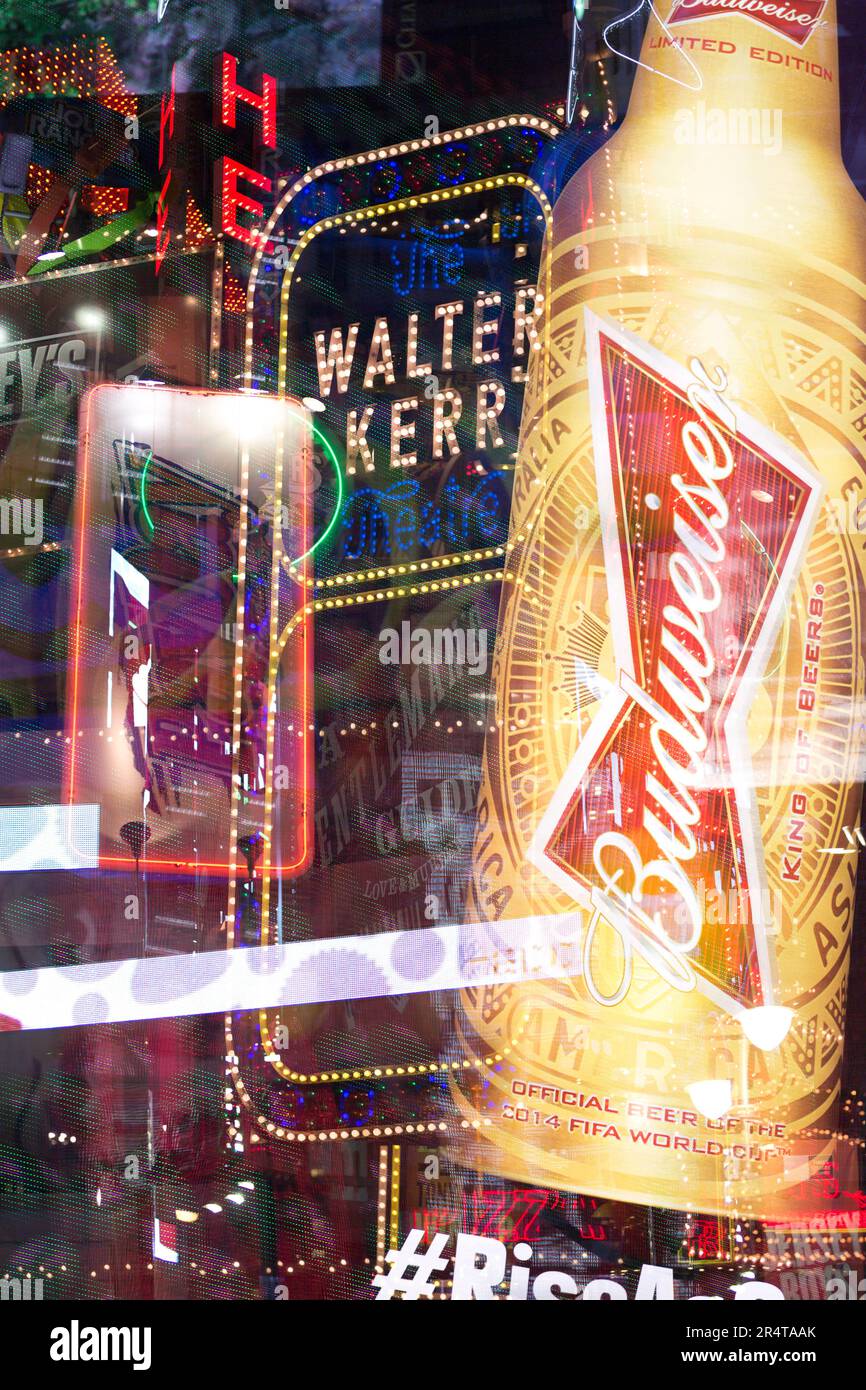 US, New York, Neon street signs around Times Square with reflections ...