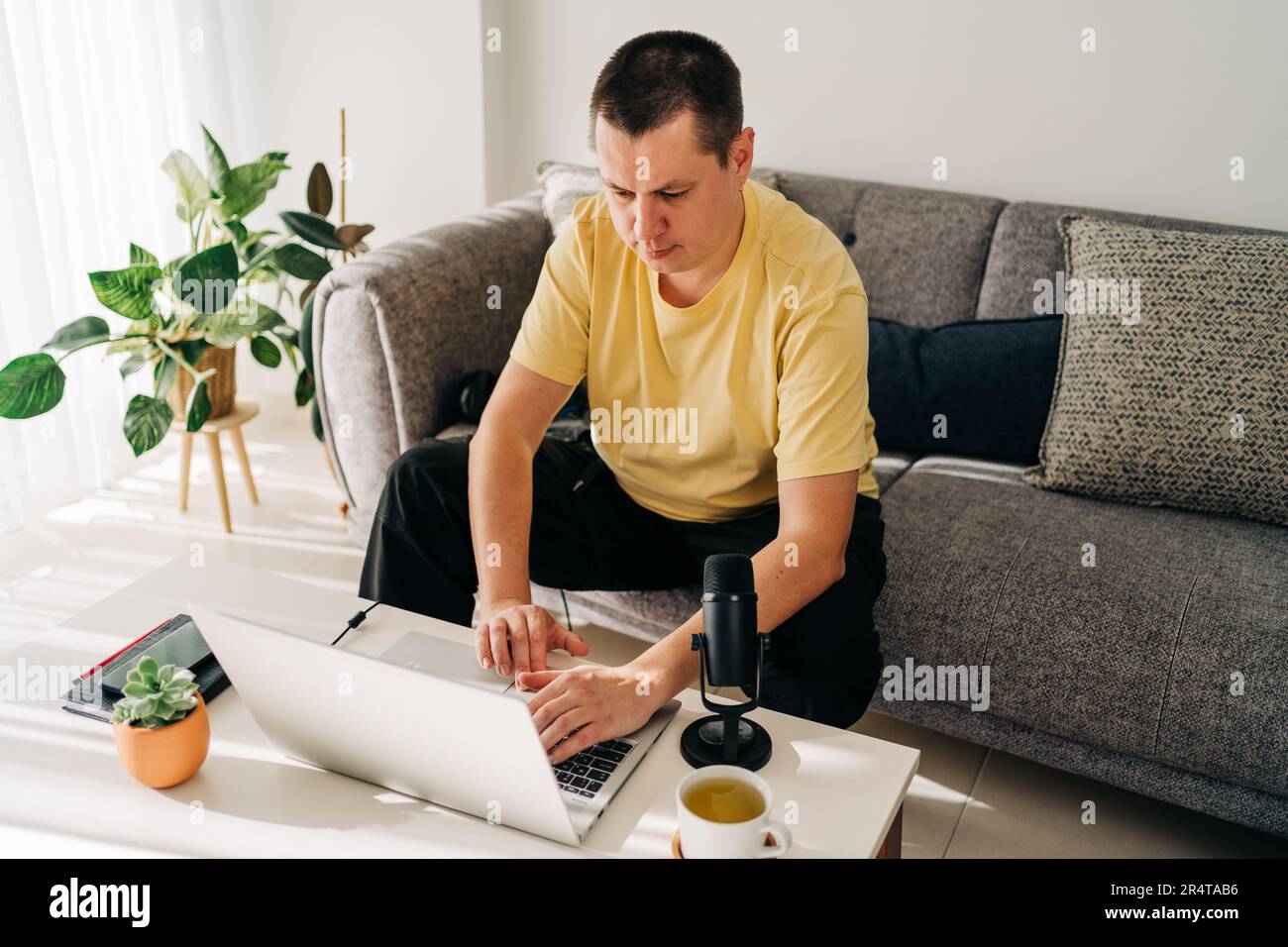 Freelancer men microphone typing hi-res stock photography and images ...