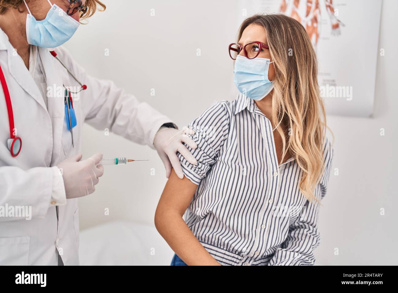 Woman having injection syringe arm hi-res stock photography and images ...