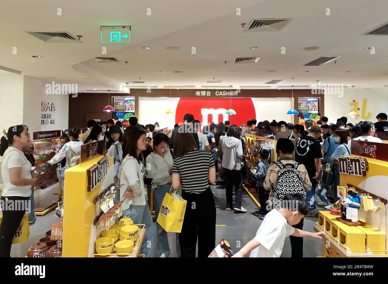 People shop at the M&M's Flagship Store in Shanghai, China, 27 May ...