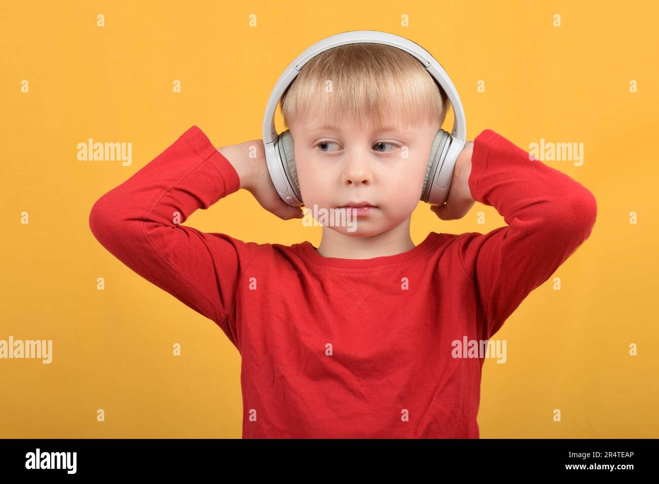 cute boy child enjoying music in headphones Stock Photo - Alamy