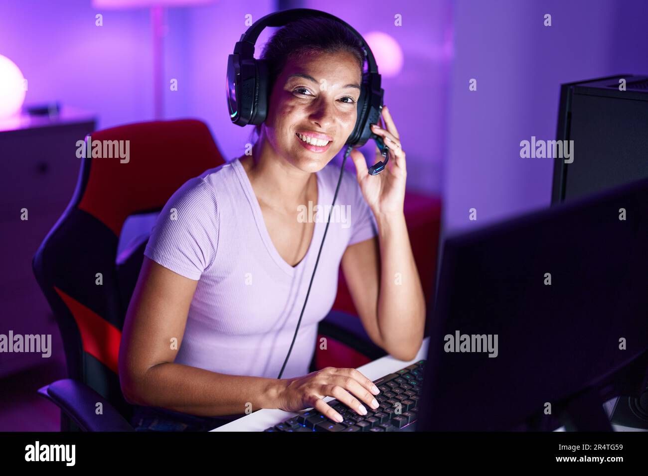 Young beautiful hispanic woman streamer smiling confident sitting on ...
