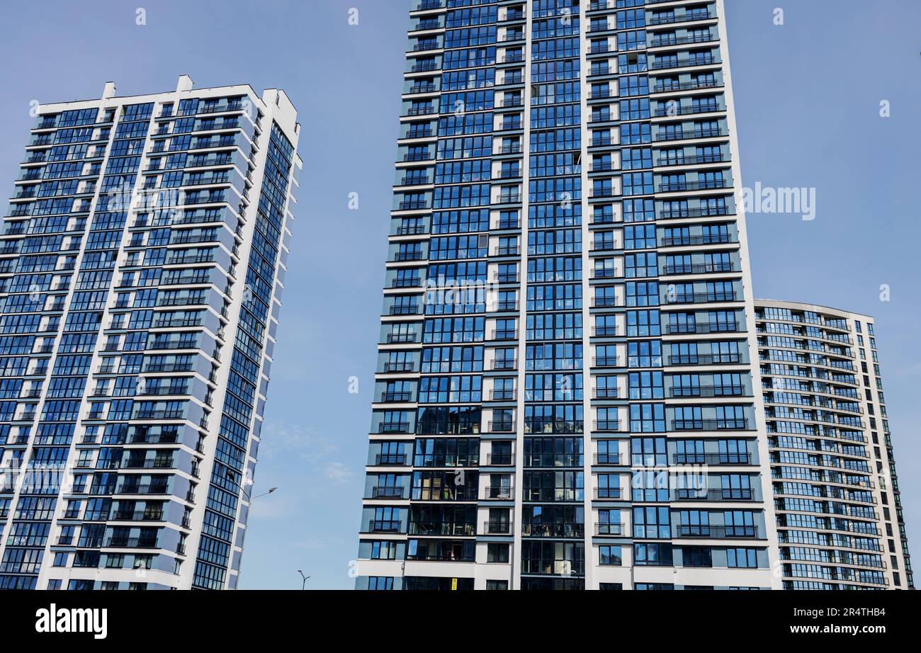 New apartment building with symmetrical modern architecture in the city ...