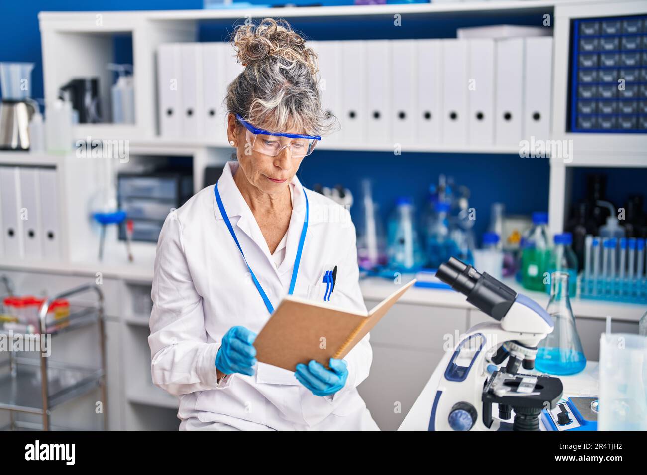 Beautiful middle age blonde scientist hi-res stock photography and ...