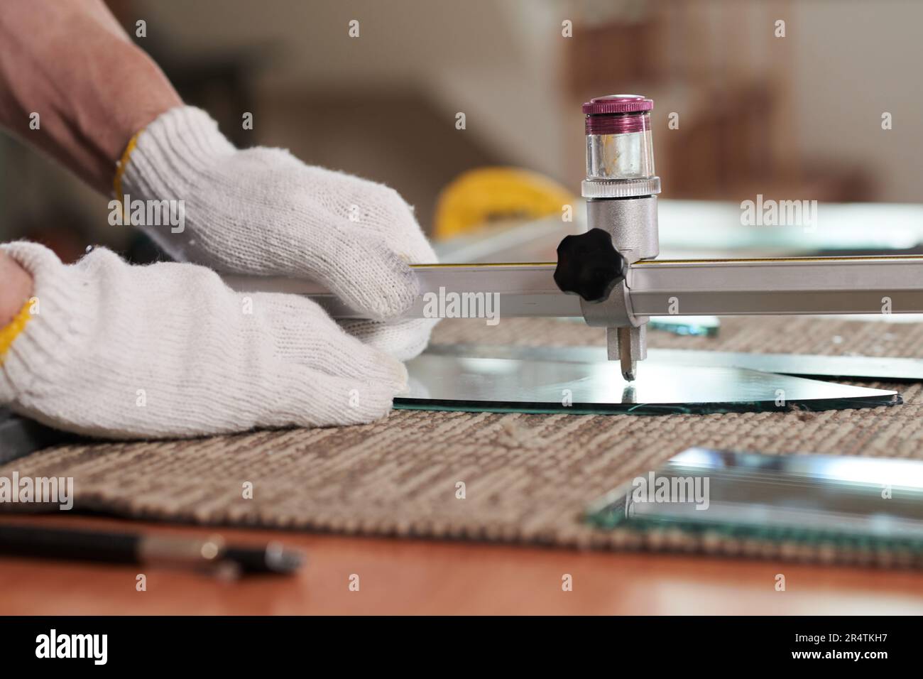 Craftsman metal worker cutting piece hi-res stock photography and ...