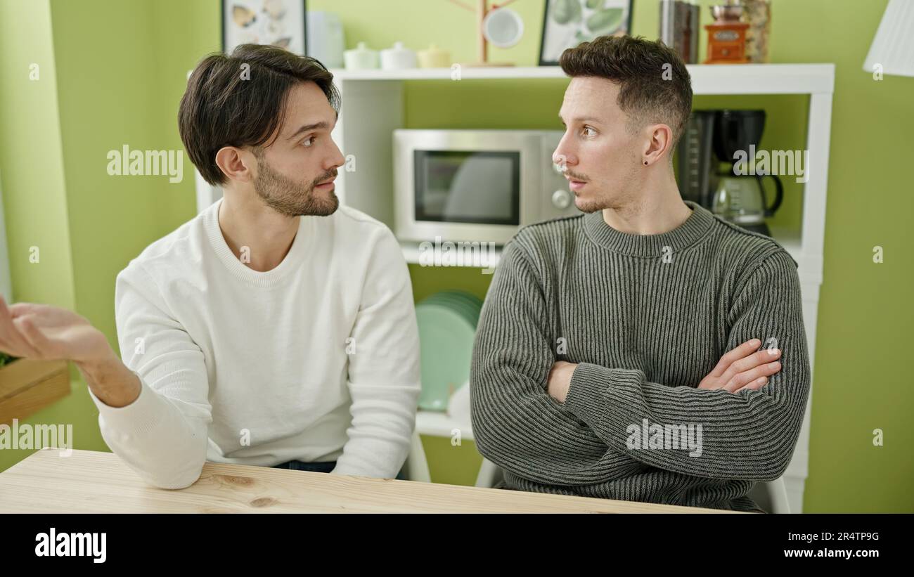 Two men couple arguing for disagreement at dinning room Stock Photo - Alamy