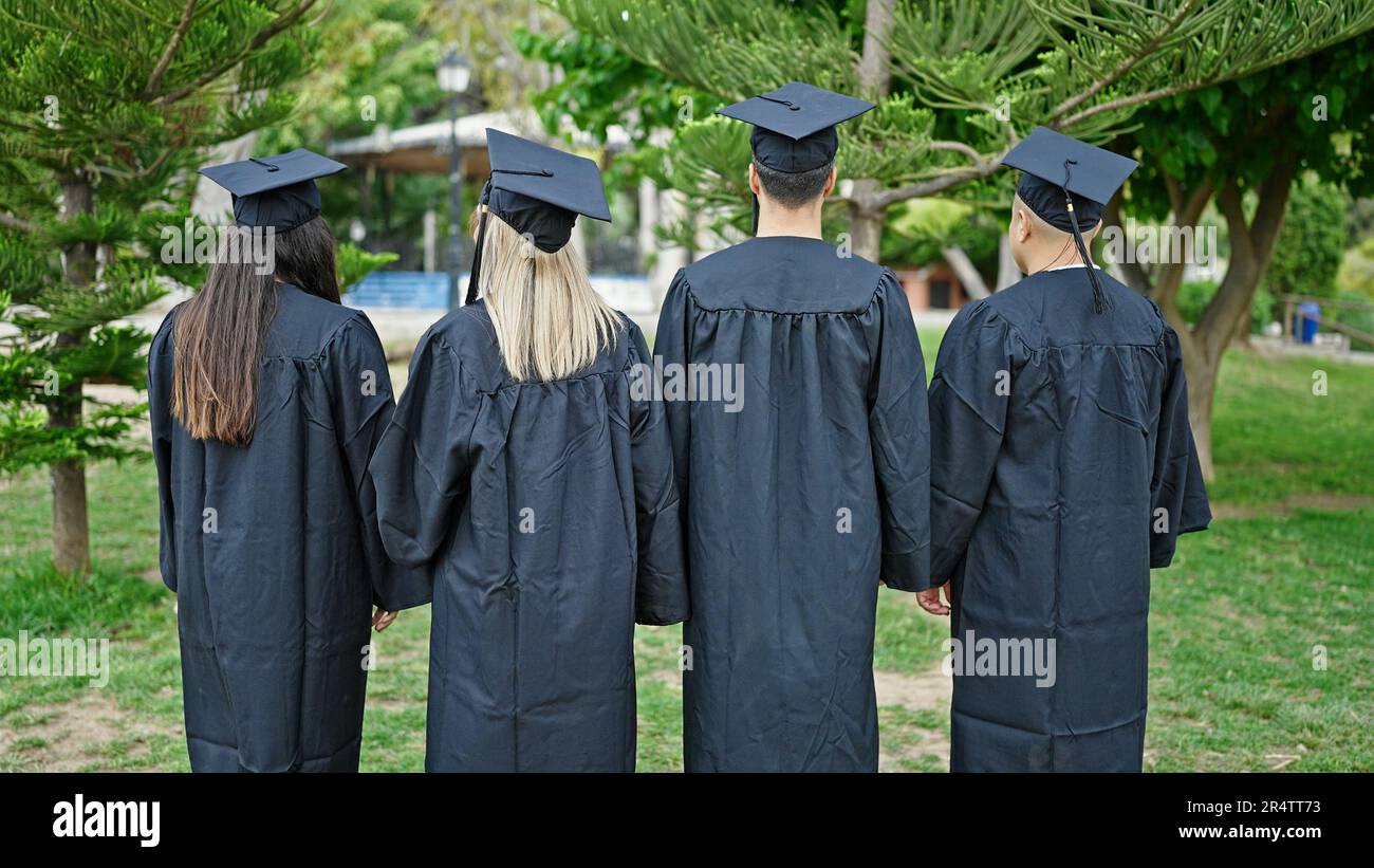 Group of people students graduated standing together backwards at ...