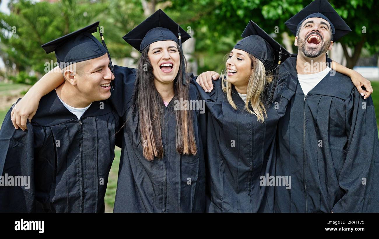 Group of people students graduated smiling confident hugging each other ...