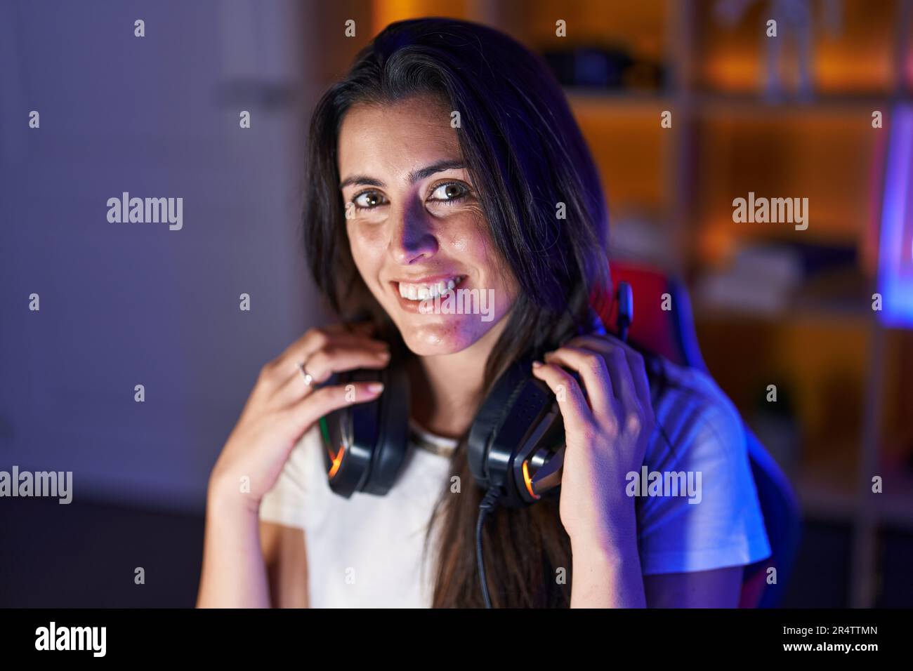 Young beautiful hispanic woman streamer smiling confident sitting on ...