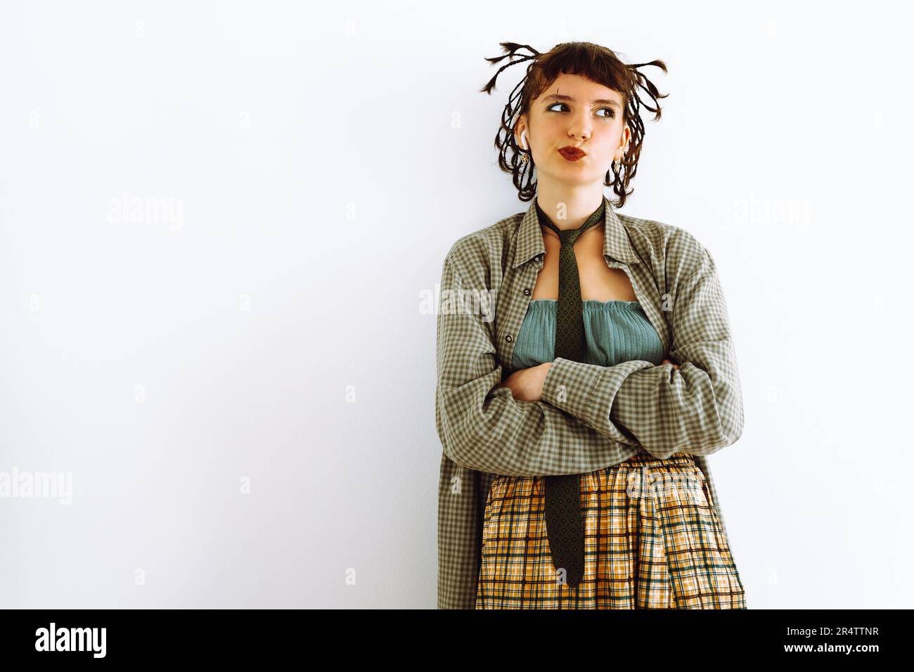 Portrait modern teenager expressing himself in appearance and clothes ...