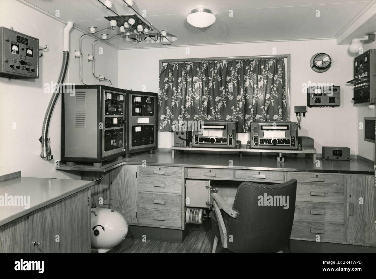 Electronic equipment in the control room of the ship, Italy 1960s Stock ...